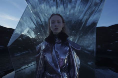 Free Image Model In Smart Fabric Outfit In Reflective Winter Landscape Premium Free AI