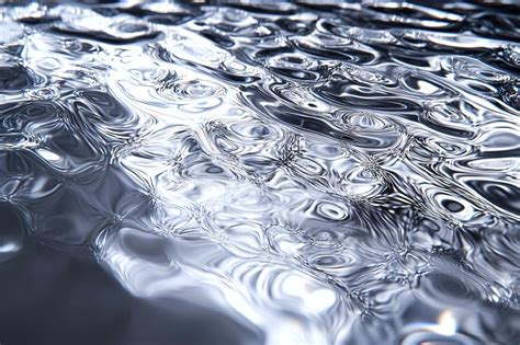 Polished Metallic Surfaces Reflecting Intricate Light Patterns Showcasing Their Aesthetic And