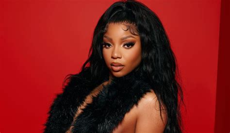 Chloe Bailey Goes Topless In A Sexy Faux Fur Mini Dress For Christmas Photoshoot BlackSportsOnline