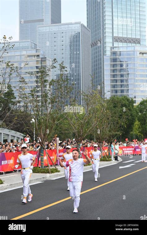 Taizhou Chinas Zhejiang Province 14th Sep 2023 Torch Bearer Yang Wenjie Runs With The Torch