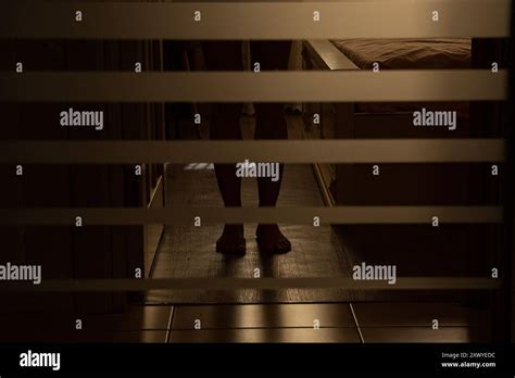 Womens Feet On The Floor In The Bedroom Barefoot In The Dark Visible