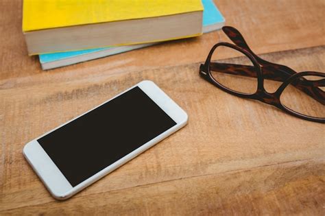 Premium Photo Close Up View Of Smartphone And Glasses