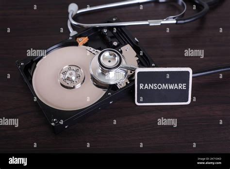 A Stethoscope Scanning For Lost Information On A Hard Drive Disc With Ransomware Word On Board