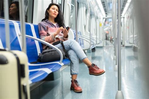 Woman Passenger Using Phone In Subway Car Stock Image Image Of Luggage Chinese 340026929