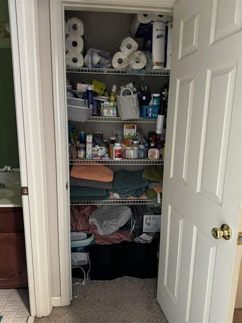 decluttering and organizing tips and tricks my hall closet is the bane of
