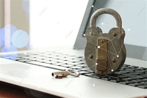 Laptop Computer Secured With An Old Key And Padlockrepresenting