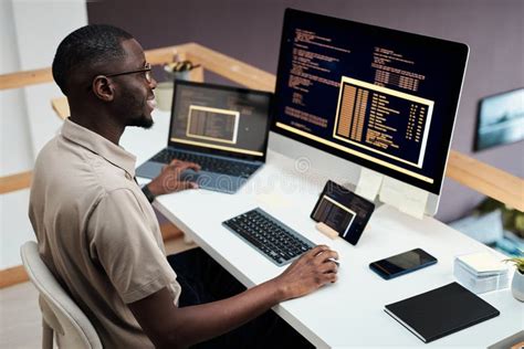 Developer Examining Programming Code Stock Photo Image Of Office Design