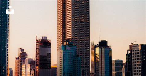 갈색과 검은 색 고층 건물 사진 Unsplash의 무료 엠파이어 스테이트 빌딩 이미지