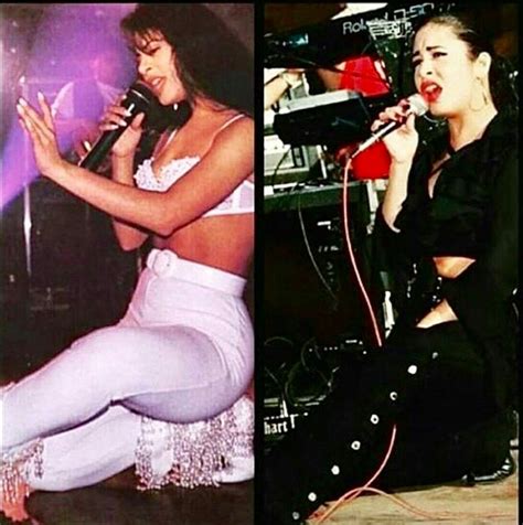 Two Women In White Pants And Black Top Singing Into Microphones