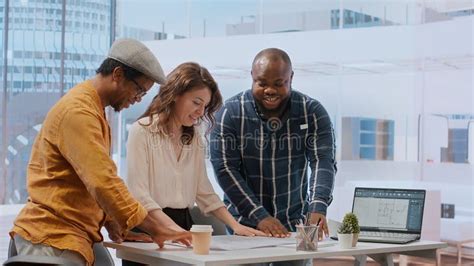 Entrepreneur Evaluating Office Building Potential Before Reaching An Agreement Stock Image