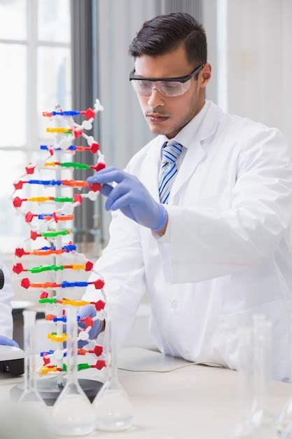 Premium Photo Scientist Analysing Dna Helix