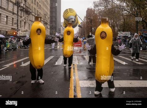 Parade Performers Lead The Stuart The Minion Float Down Central Park West During The Macys