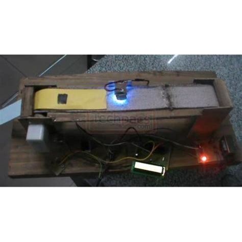 Automated Fabric Paint Defect Detection System Using Microcontroller And Color Sensors
