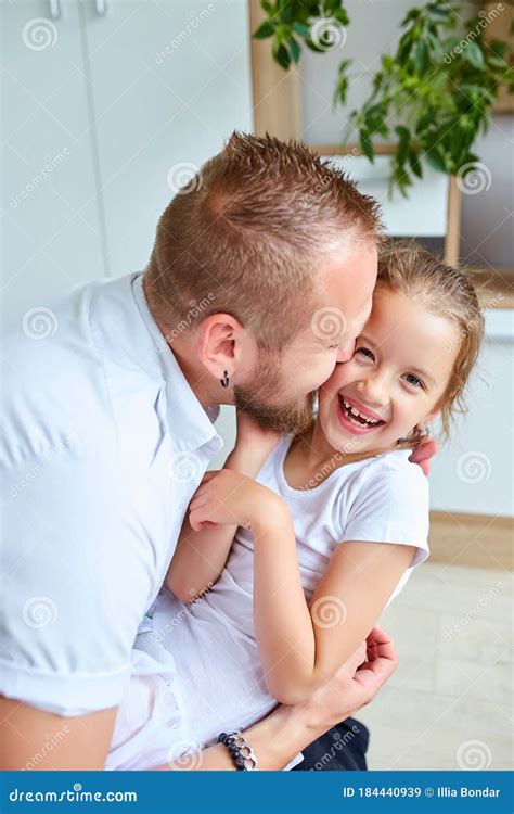 Father And Daughter In White Spending Time At Home Stock Image Image