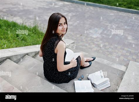 Portrait Of A Fabulous Woman In Black Polka Dot Dress Sitting On The