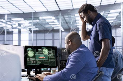 Upset Coworkers In Data Center Getting Access Denied Doing Face Palm Gesture Stock Image