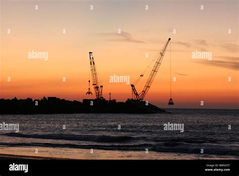 Cranes Working On The Sea Stock Photo Alamy