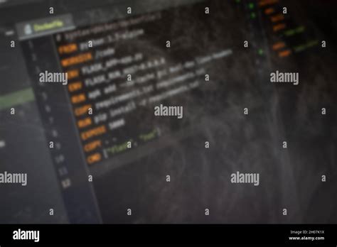 Docker File Hello World Code On Screen Blurry Background Image Stock Photo Alamy