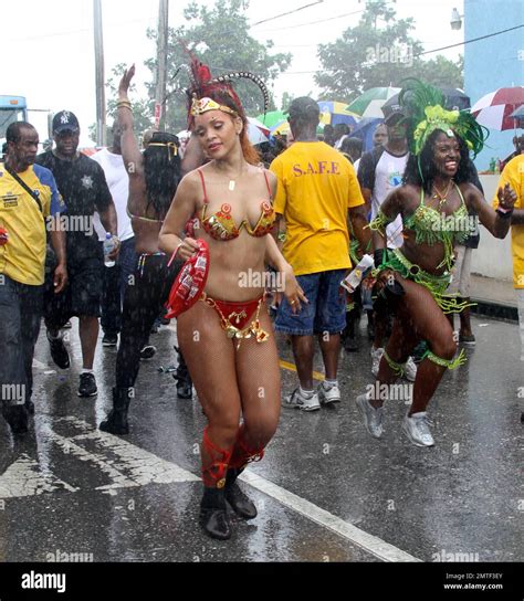 Rihanna Appears In A Parade In The Rain As She Celebrates Kadooment Day