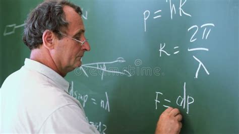 Professor Writes Formulas For Force Of Newtons Stock Video Video Of Formula Indoor 321542831