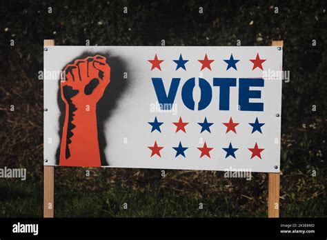 Homemade Voting Sign With Red And Blue Stars And Raised Fist Stock