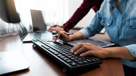 Team Of Programmer Working To Find Solution To Problem And Coding Technologies In A Software