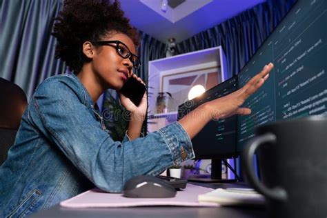 african it developer concentrating codding program on laptop screen