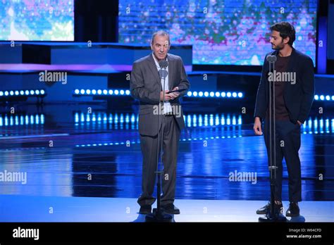Israeli Company Production Representative Daniel Paran Left And Actor Daniel Gad Speak During