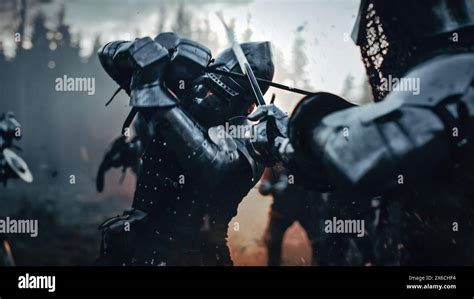 Medieval Knight Walking On Battlefield Amidst Dead Enemies Last