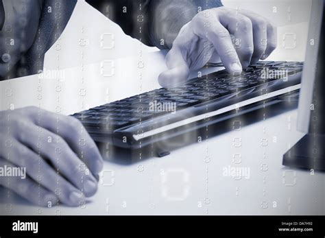 Businessman Typing In A Computer Keyboard Blue Tone Binary Data Overlay Stock Photo Alamy