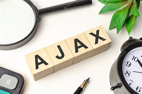 premium photo word ajax made with wooden blocks and office supplies