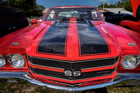 Closeup Shot Of The Front View Of A Red Chevy Ss 1970 At An Open Air