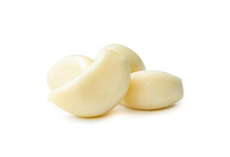 Peeled Garlic Cloves In Stack Isolated With Clipping Path And Shadow In