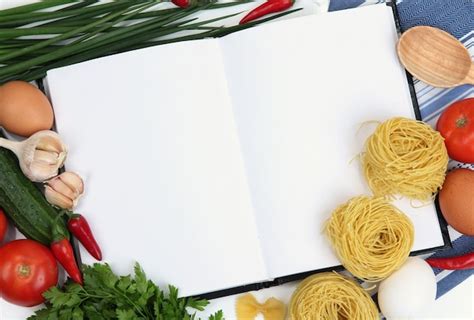 Premium Photo Cooking Concept Groceries With Empty Cookbook Close Up