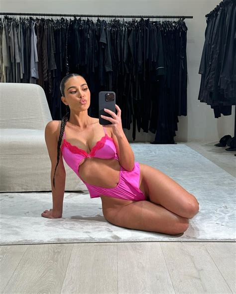 Kim Kardashian Makes Jaws Drop As She Spills Out Of Deep Cleavage Bra