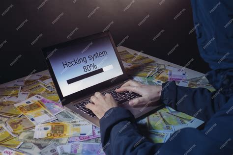 Premium Photo Anonymous Hacker Programmer Uses A Laptop To Hack The