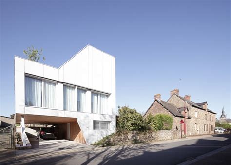 Retrofitted Shipping Containers Form Angular Flying Box House