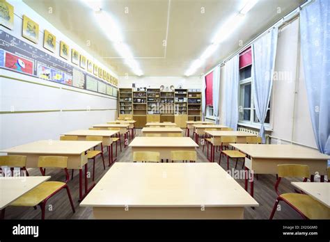Tables And Chairs Inside Empty Physics School Class Educational