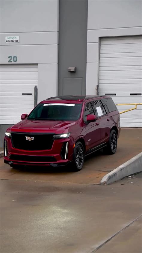 2023 Pre Owned Escalade V In Radiant Red Tintcoat At Tom Peacock