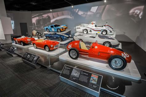 Download Petersen Automotive Museum Classic Racing Cars Exhibit Wallpaper