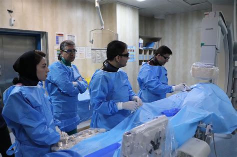 دانشگاه علوم پزشکی شهید بهشتی درمان بیمار قلبی با کمک دستگاه