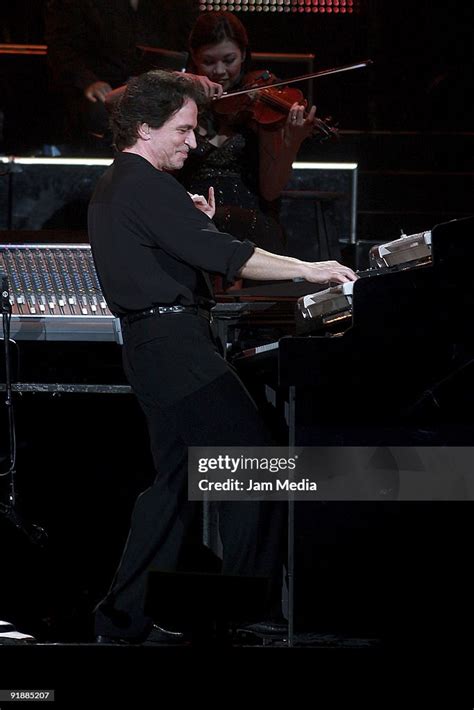 Singer Yanni Plays Keyboard During A Concert At Arena Monterrey On