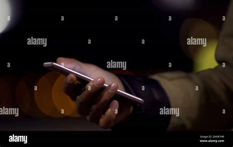 lady scrolling web pages on her modern smartphone looking for