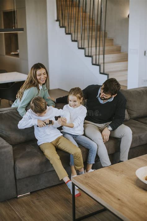Siblings Fighting Over Tv Remote Control At Home Stock Image Image Of Adult Controller
