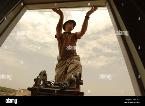 Us Navy Construction Electrician 2nd Class Assigned To Naval Mobile Construction Battalion Seven