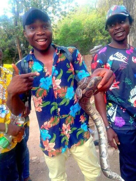 Man Poses With Life Python On His Neck In Imo Says They Dont Bite Photos Science Technology