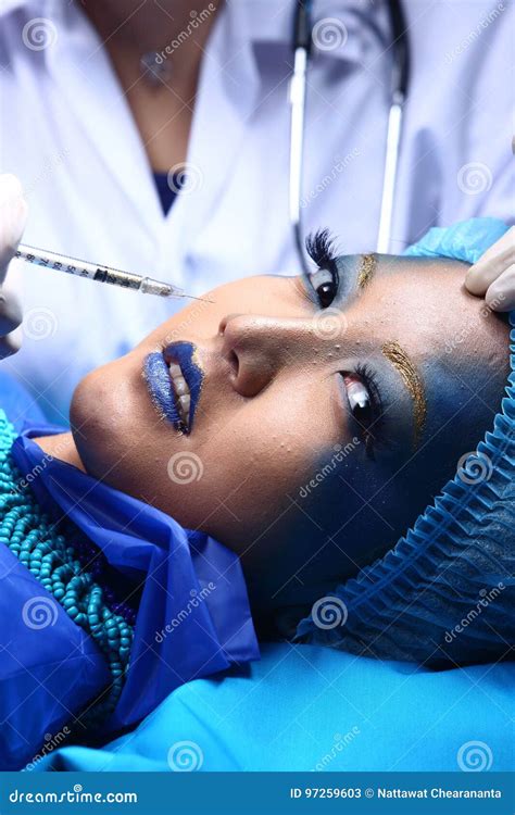 Creative Plastic Surgery On Blue Tone Fashion Patient Female Mod Stock
