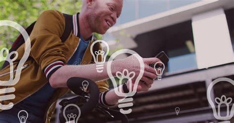 Image Of Light Bulb Icons And Data Processing Over African American