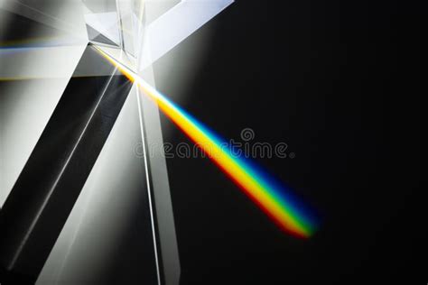 Triangular Prism Dispersing Sun Beam Splitting Into A Spectrum On White Background Stock Image