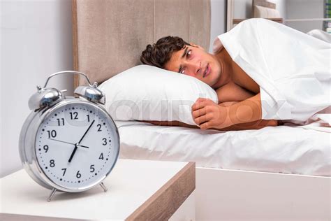 Man Having Trouble Waking Up In The Morning Stock Image Colourbox